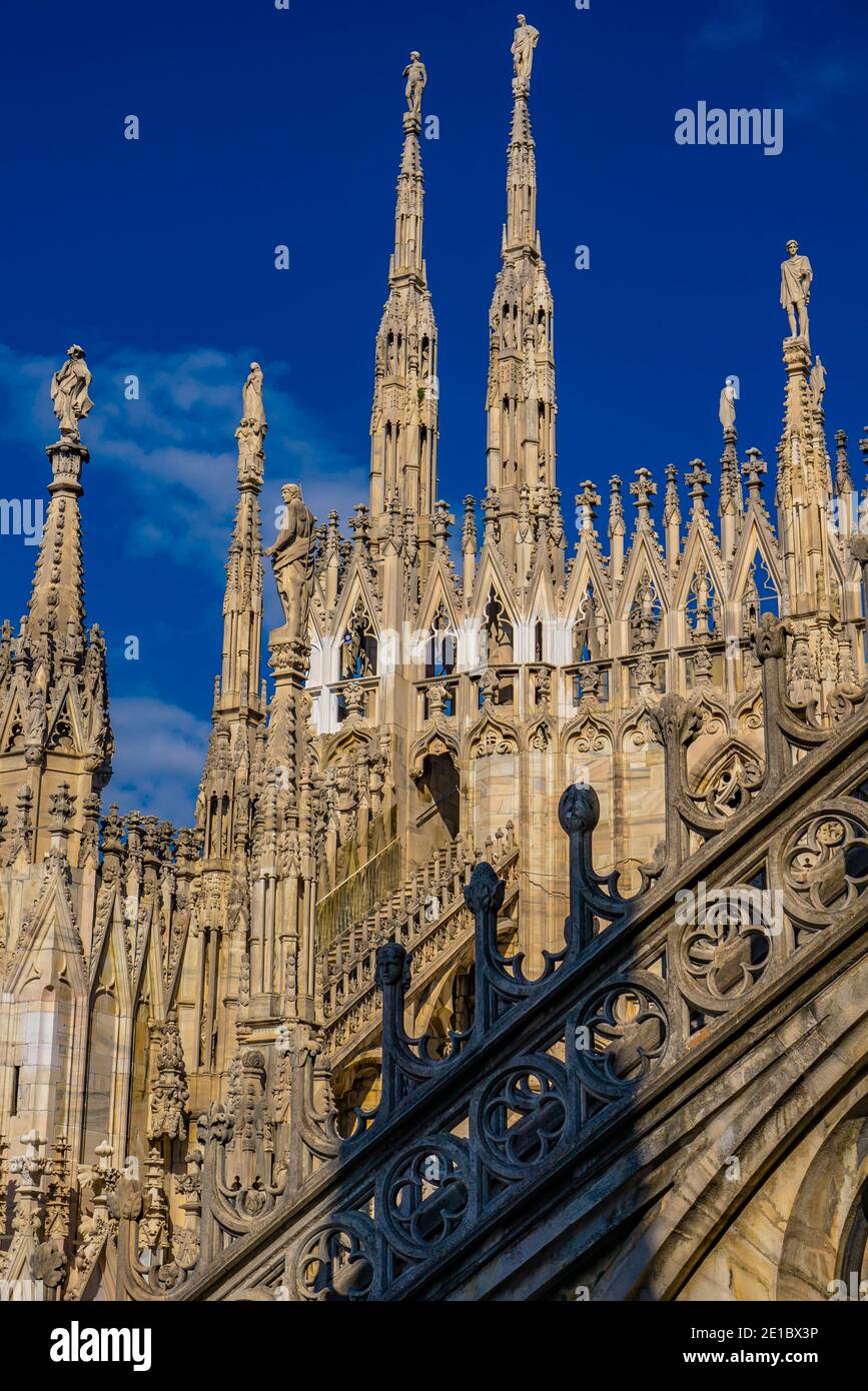Gothic rooftop terraces of Milan Duomo in Italy Stock Photo - Alamy
