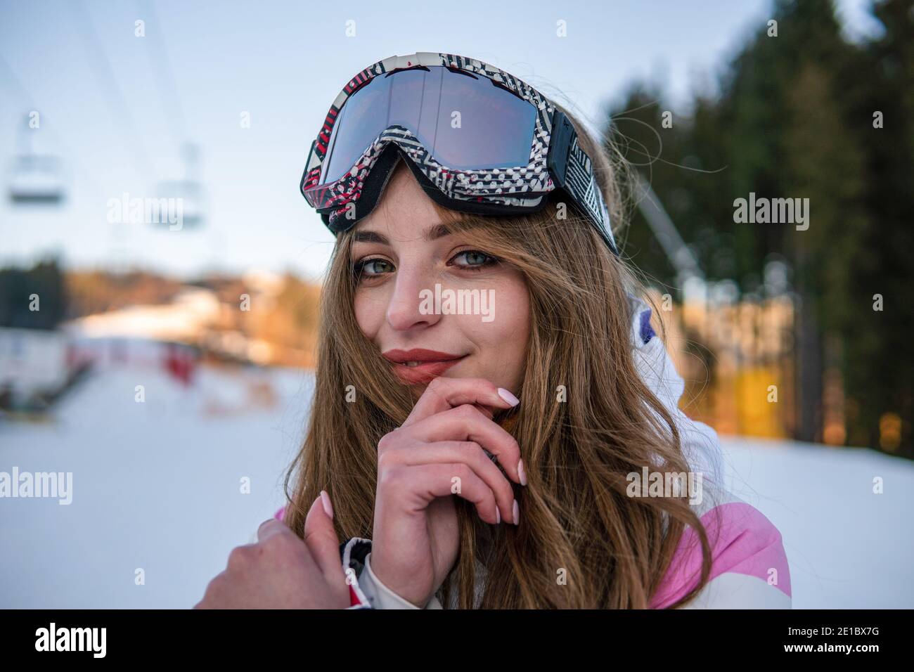 Portrait of Happy Pretty Caucasian woman in ski outfit and With ...