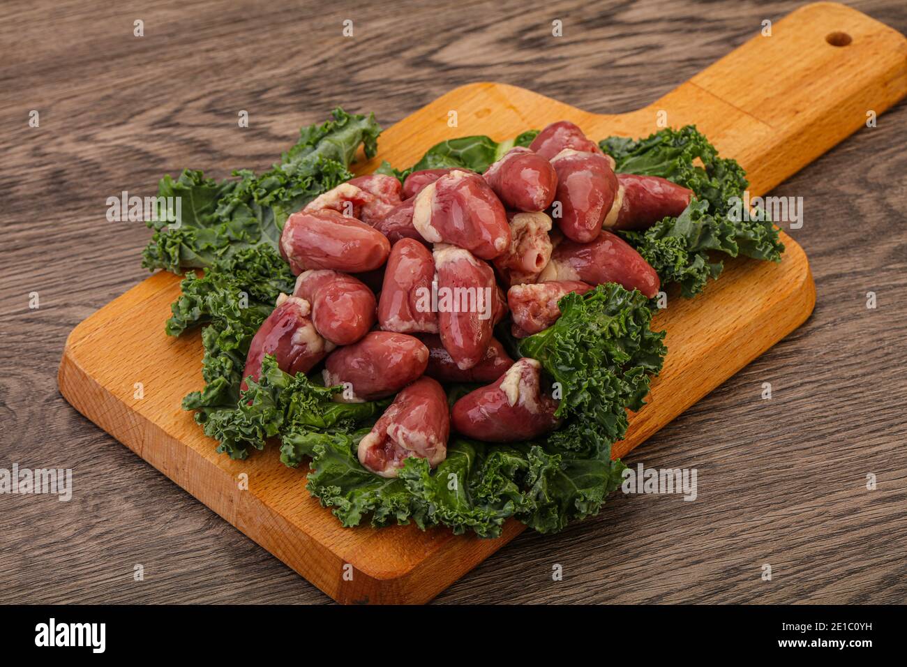 Raw chicken hearts heap for cooking Stock Photo - Alamy