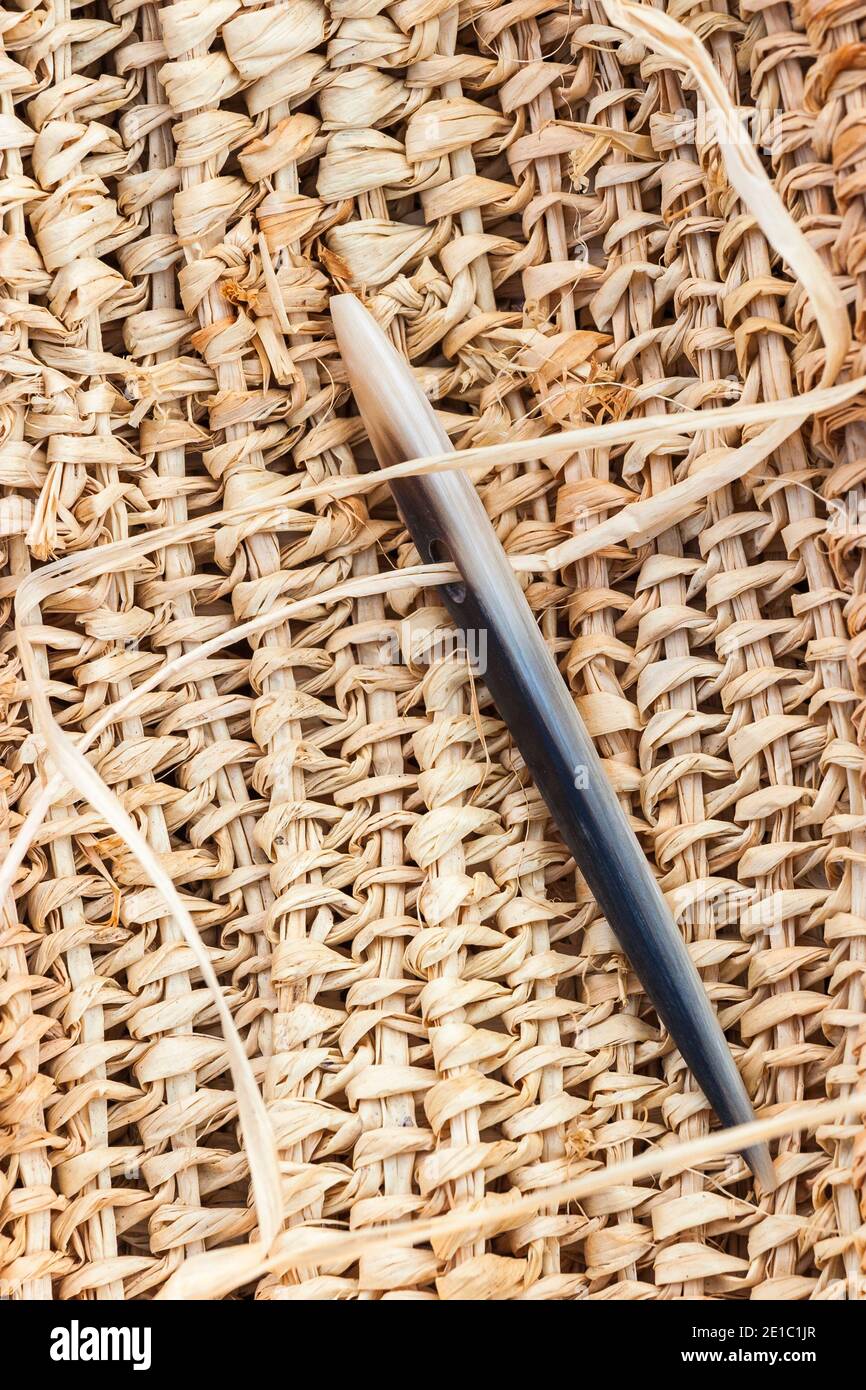 Weave basket with a prehistoric needle Stock Photo - Alamy