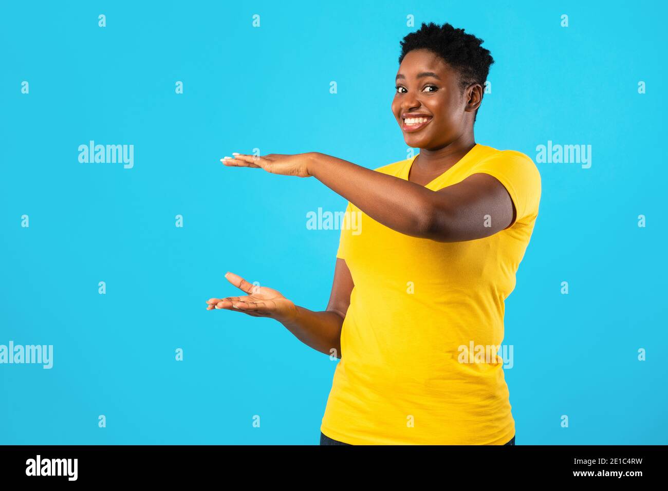 Woman holding object hi-res stock photography and images - Alamy