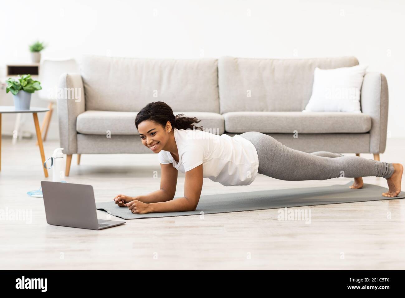 Woman Exercise Room Plank High Resolution Stock Photography and Images ...