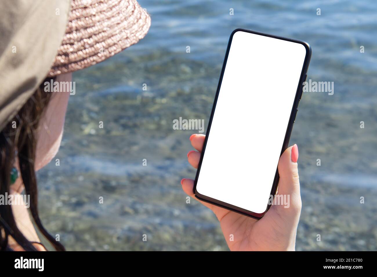 mockup cellphone sea vacation. Mock-up image of a hand holding and ...