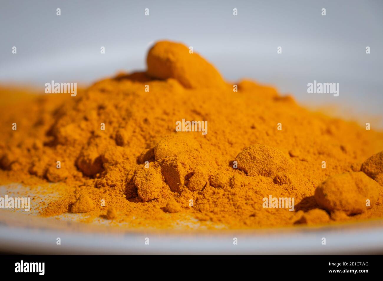 Dried and ground turmeric in a pile, ready for use in tasty dishes ...