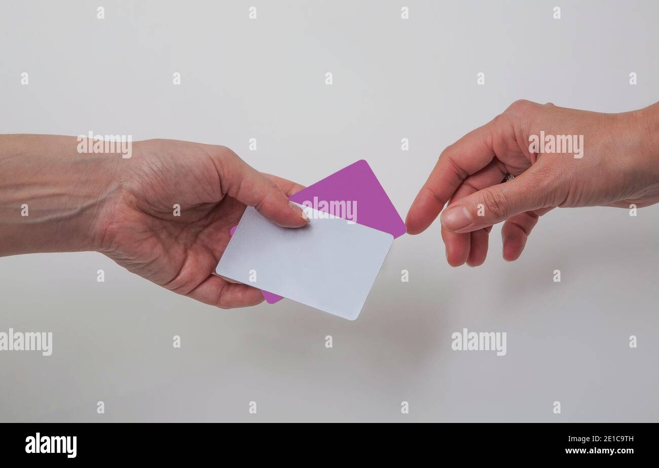Business people exchanging cards images Stock Photo - Alamy