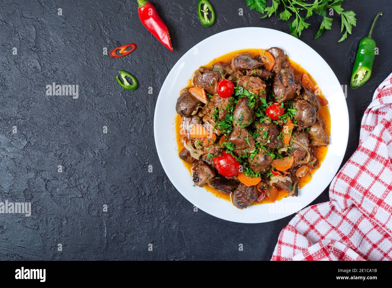 Roast offal with vegetables. Armenian dish Kuchmachi Stock Photo - Alamy