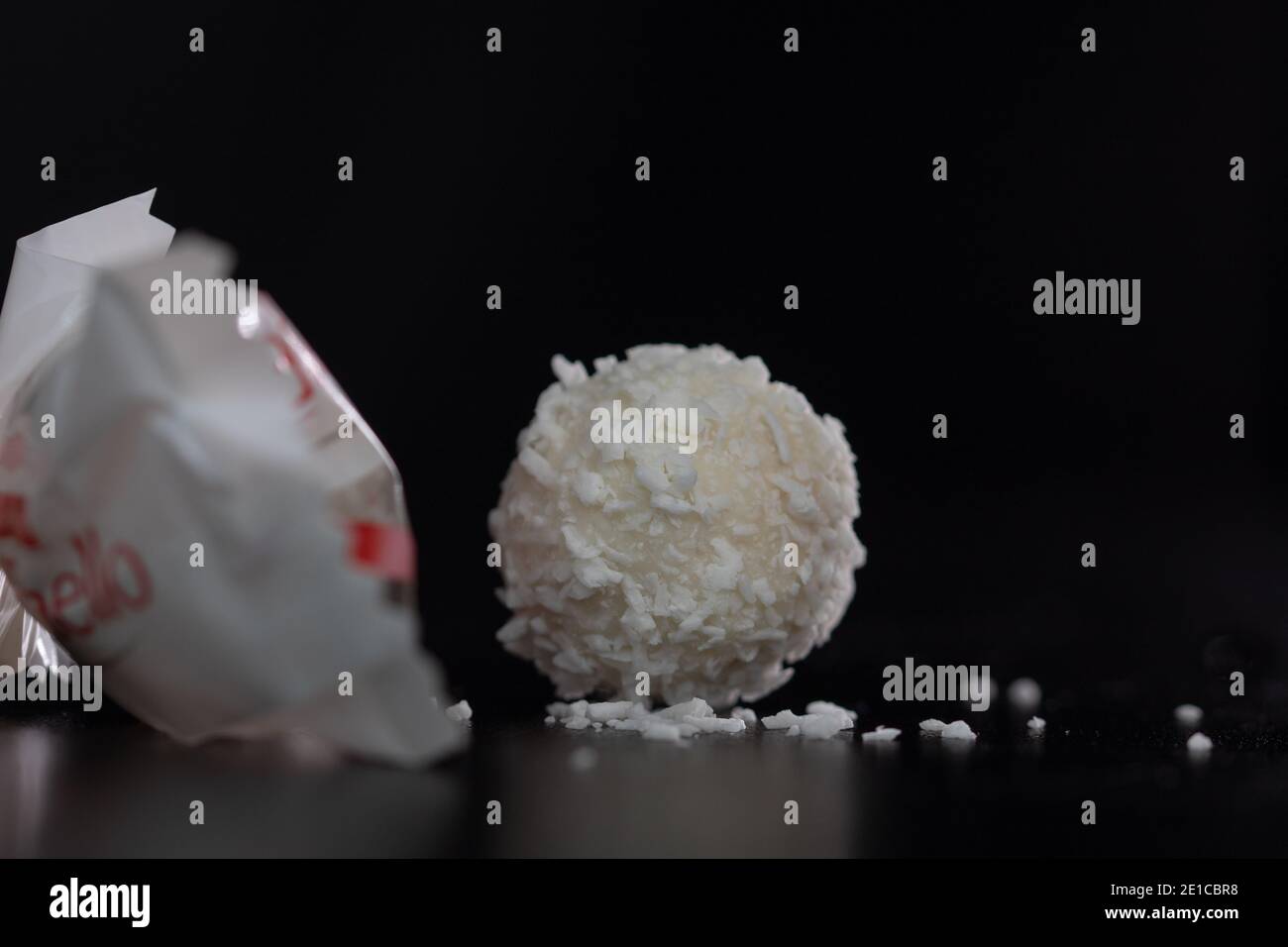 Ferrero Raffaello white candy with coconut flakes isolated. Bucharest ...