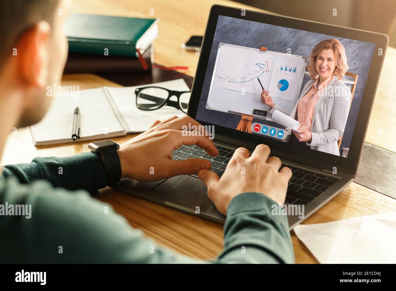 Student at laptop having online class with tutor learning indoors Stock ...