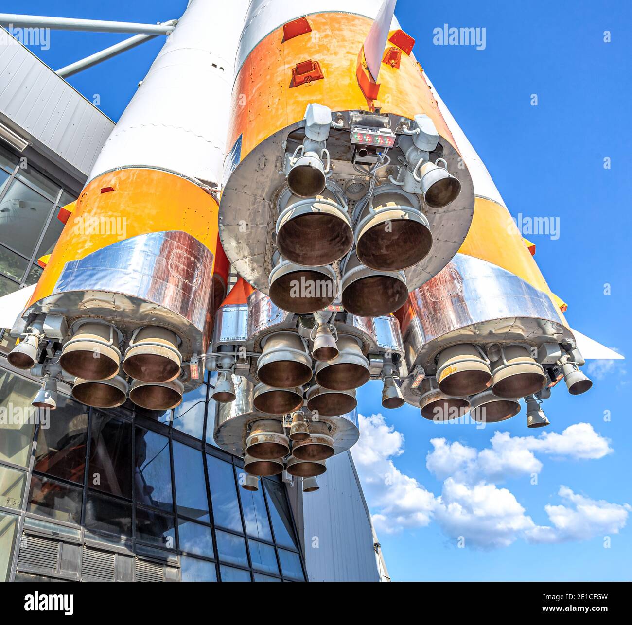 Space rocket engines of the russian spacecraft over blue sky background ...