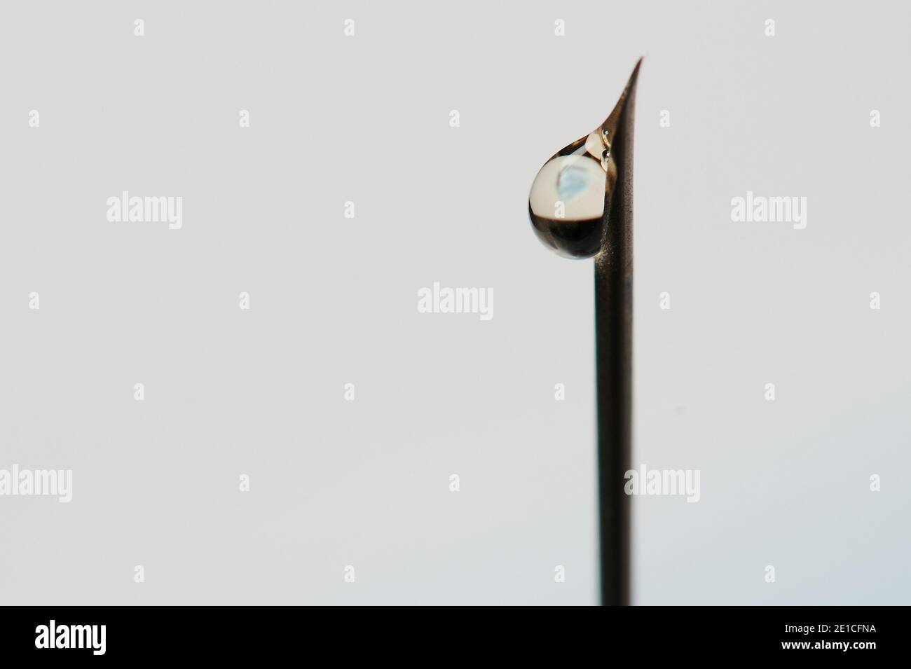 Liquid drop on needle end hi-res stock photography and images - Alamy