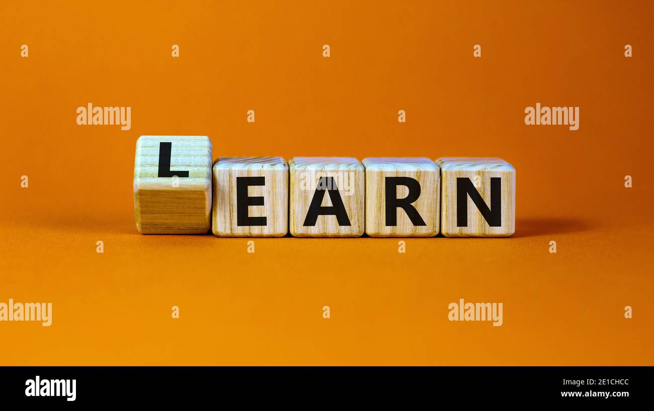 Learn or earn symbol. Turned a cube and changed the word 'earn' to ...