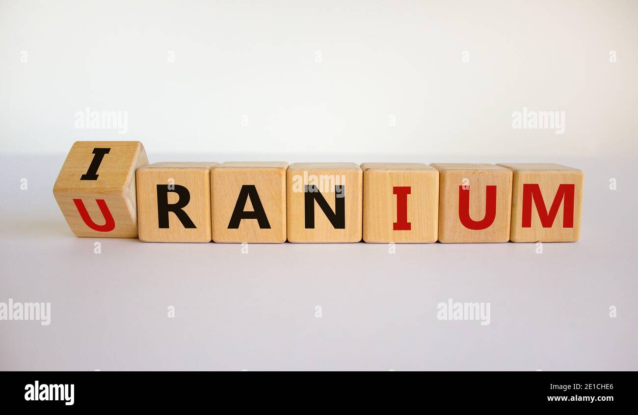 Uranium enrichment in Iran symbol. Turned cubes with words 'Iran ...