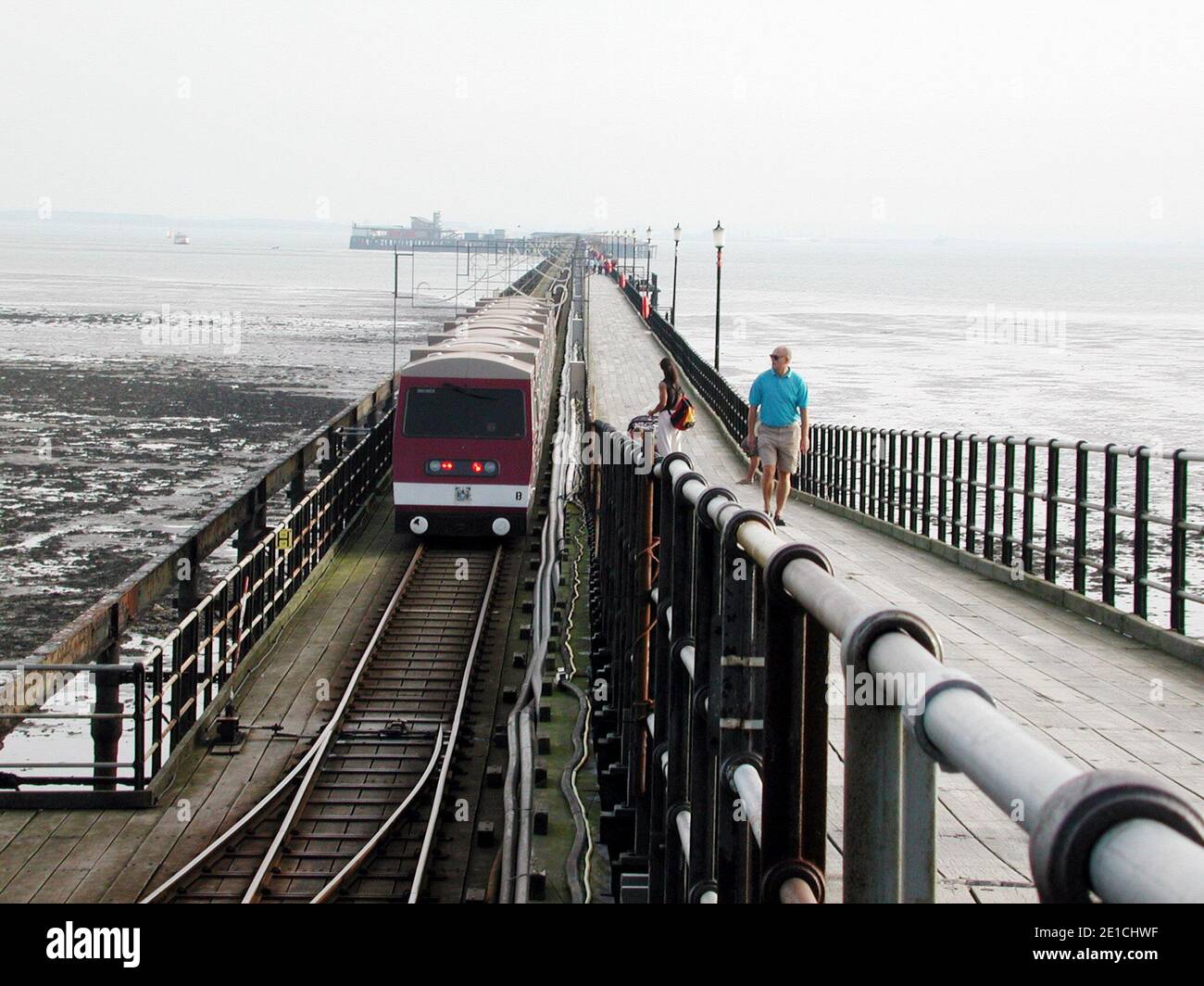 Southend Pier Railway Southend one mile long Pier with train and walker ...