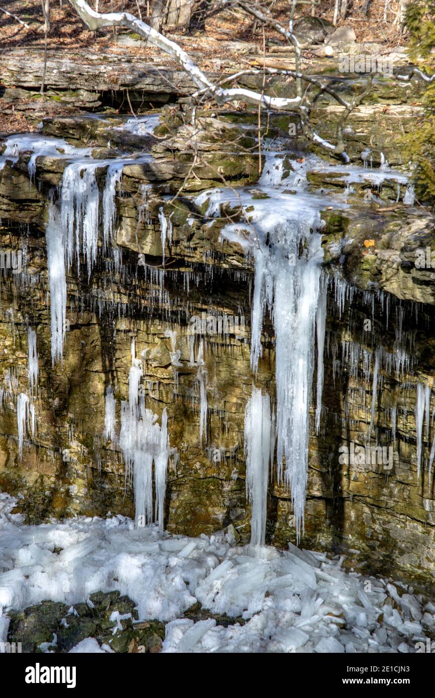 river flowing over the cliff creating a beautiful waterfall Stock Photo ...