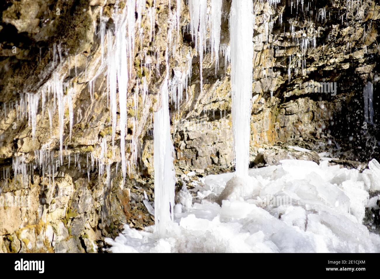 river flowing over the cliff creating a beautiful waterfall Stock Photo ...