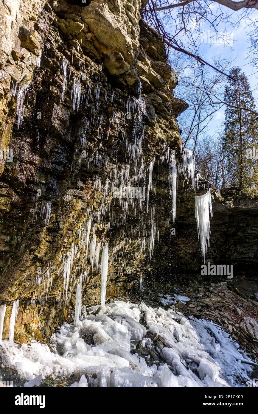 river flowing over the cliff creating a beautiful waterfall Stock Photo ...