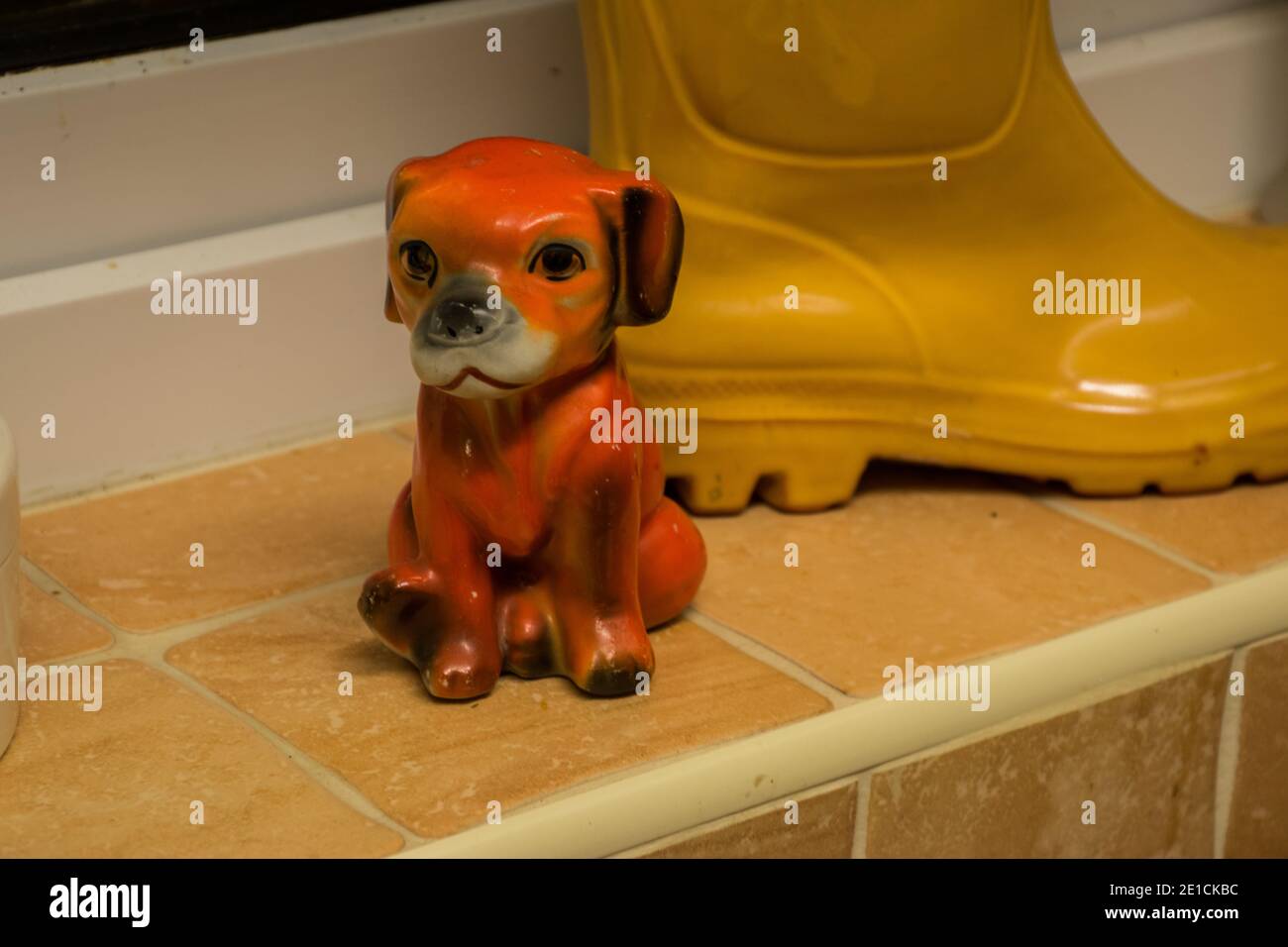 A small ceramic puppy Stock Photo - Alamy