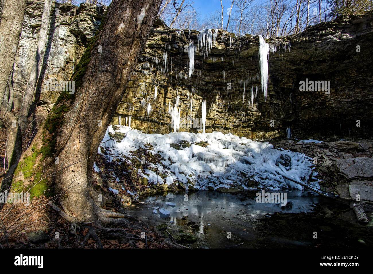 river flowing over the cliff creating a beautiful waterfall Stock Photo ...