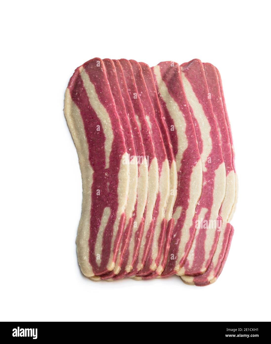 Unsmoked plant-based bacon rashers isolated on white Stock Photo - Alamy