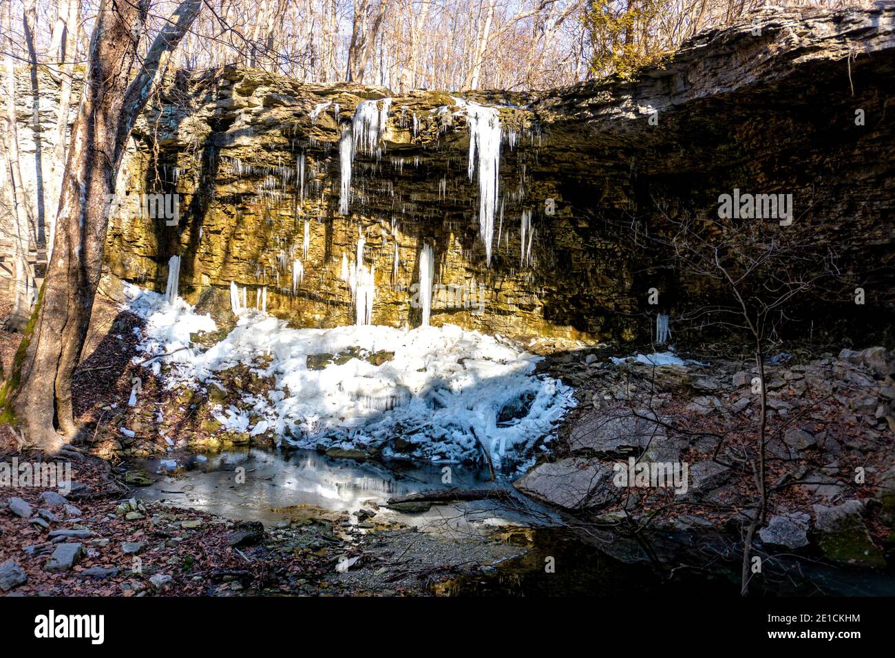 river flowing over the cliff creating a beautiful waterfall Stock Photo ...