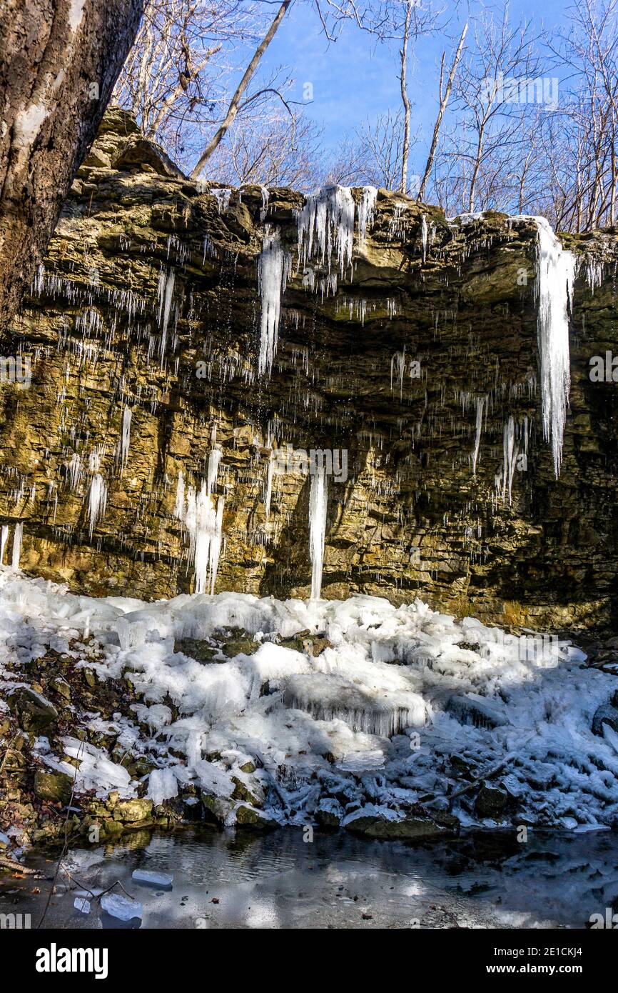 river flowing over the cliff creating a beautiful waterfall Stock Photo ...