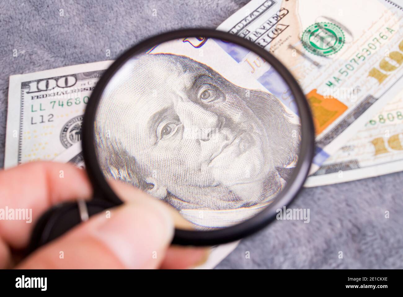 Checking authenticity hi-res stock photography and images - Alamy