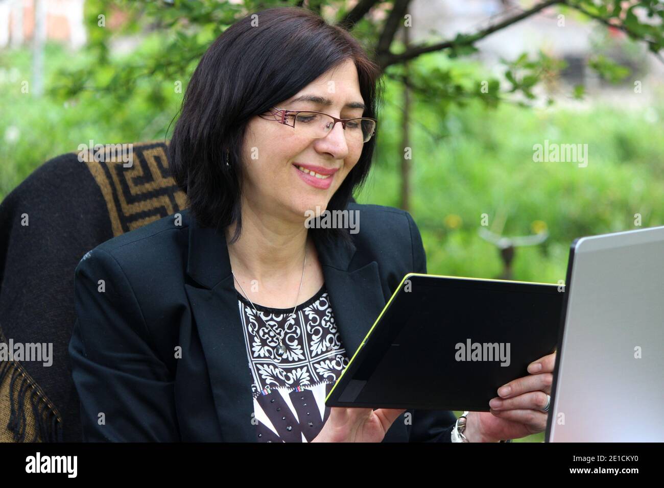 beautiful women with tablet Stock Photo - Alamy
