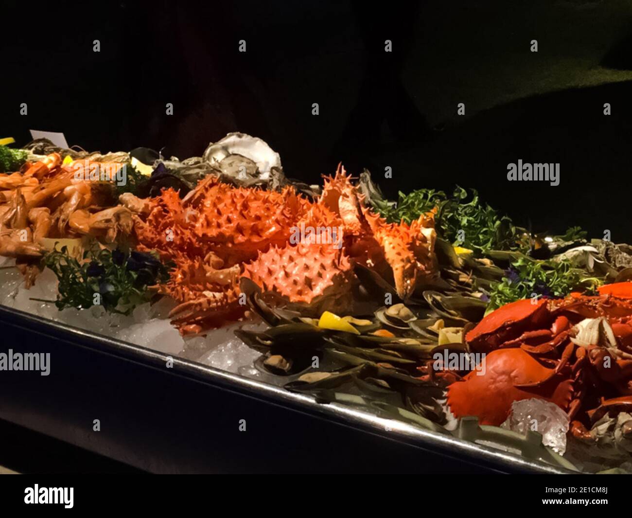 Boiled crab, shrimp and oysters. Lunch at the restaurant Stock Photo ...