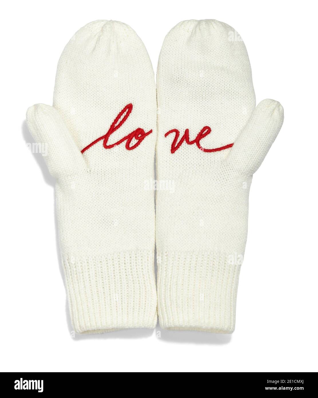 White and red pair of knit mittens with LOVE stitched in them ...