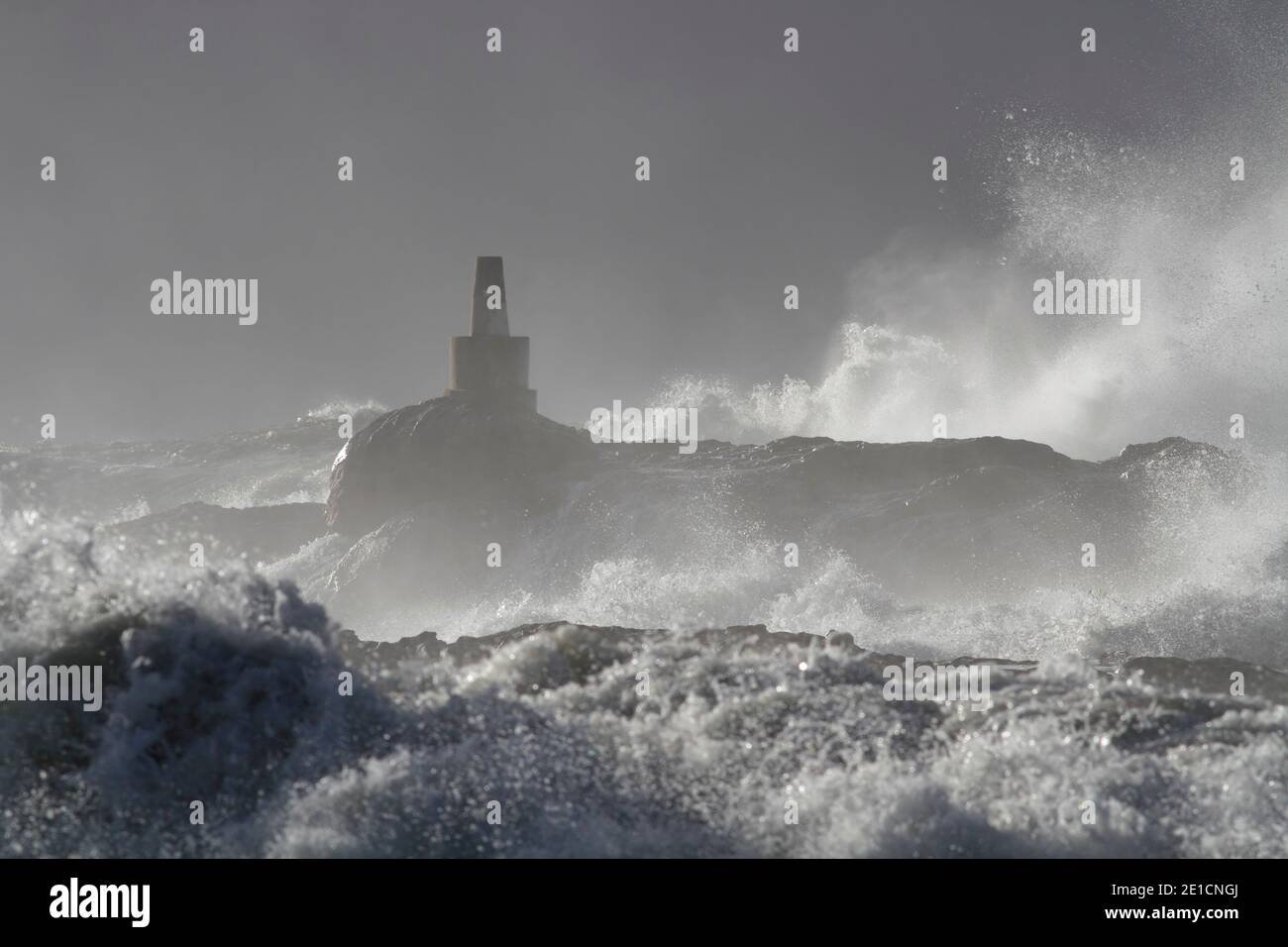 Storm on the coast seeig big wave breaking over rocks and cliffs seeing ...