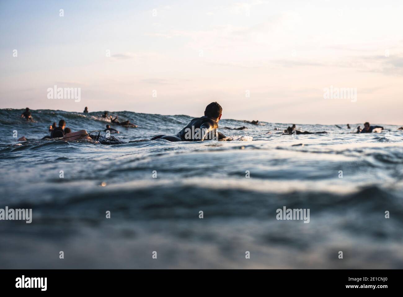 Summer surf lineup during golden hour in Rhode Island Stock Photo - Alamy