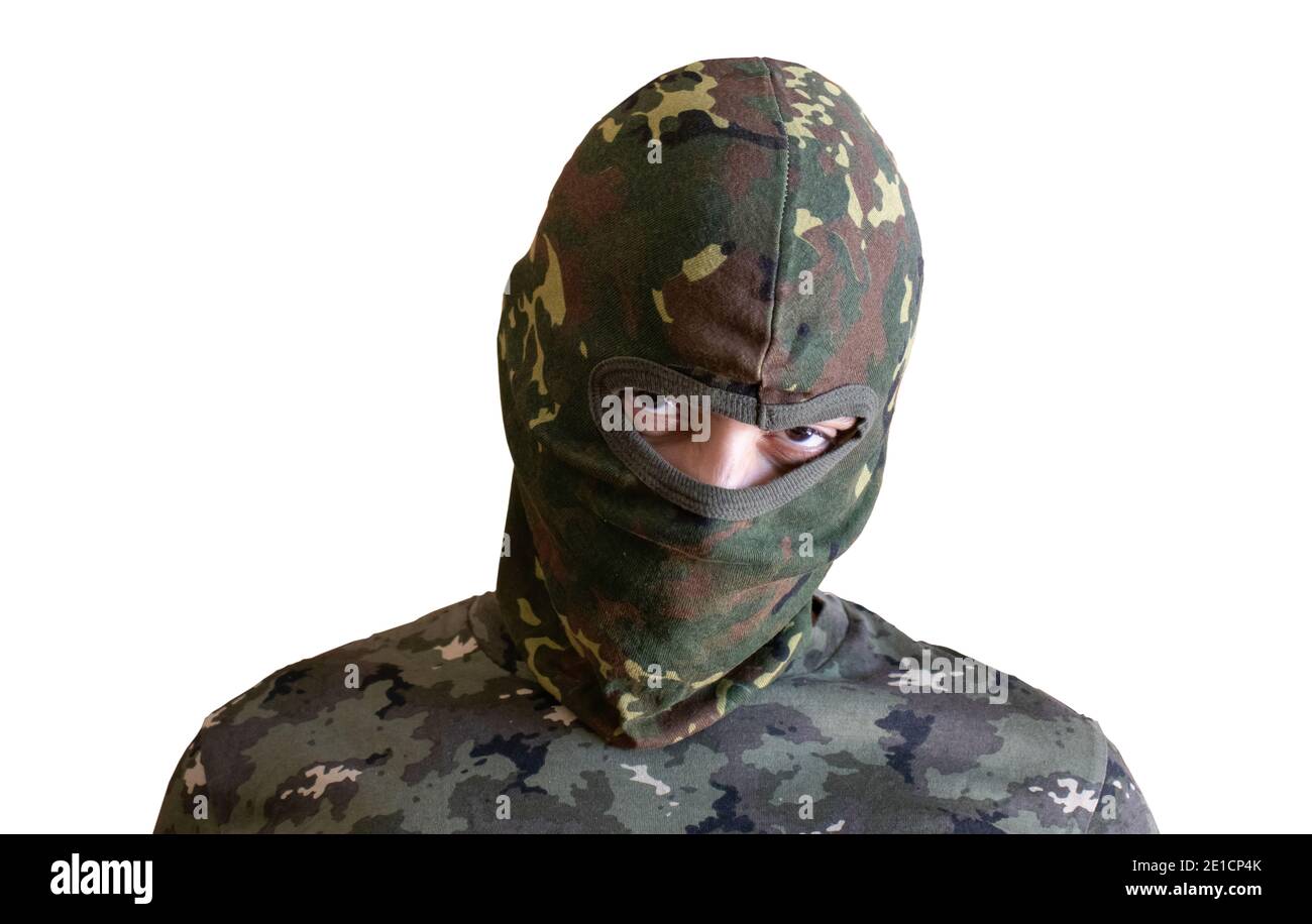Angry soldier militant with green camouflage balaclava isolated on ...