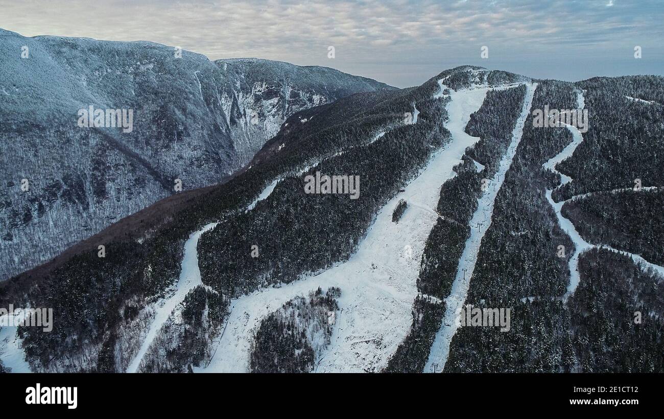 Aerial view to Stowe Mountain Ski Resort in Vermont, USA. Early winter ...