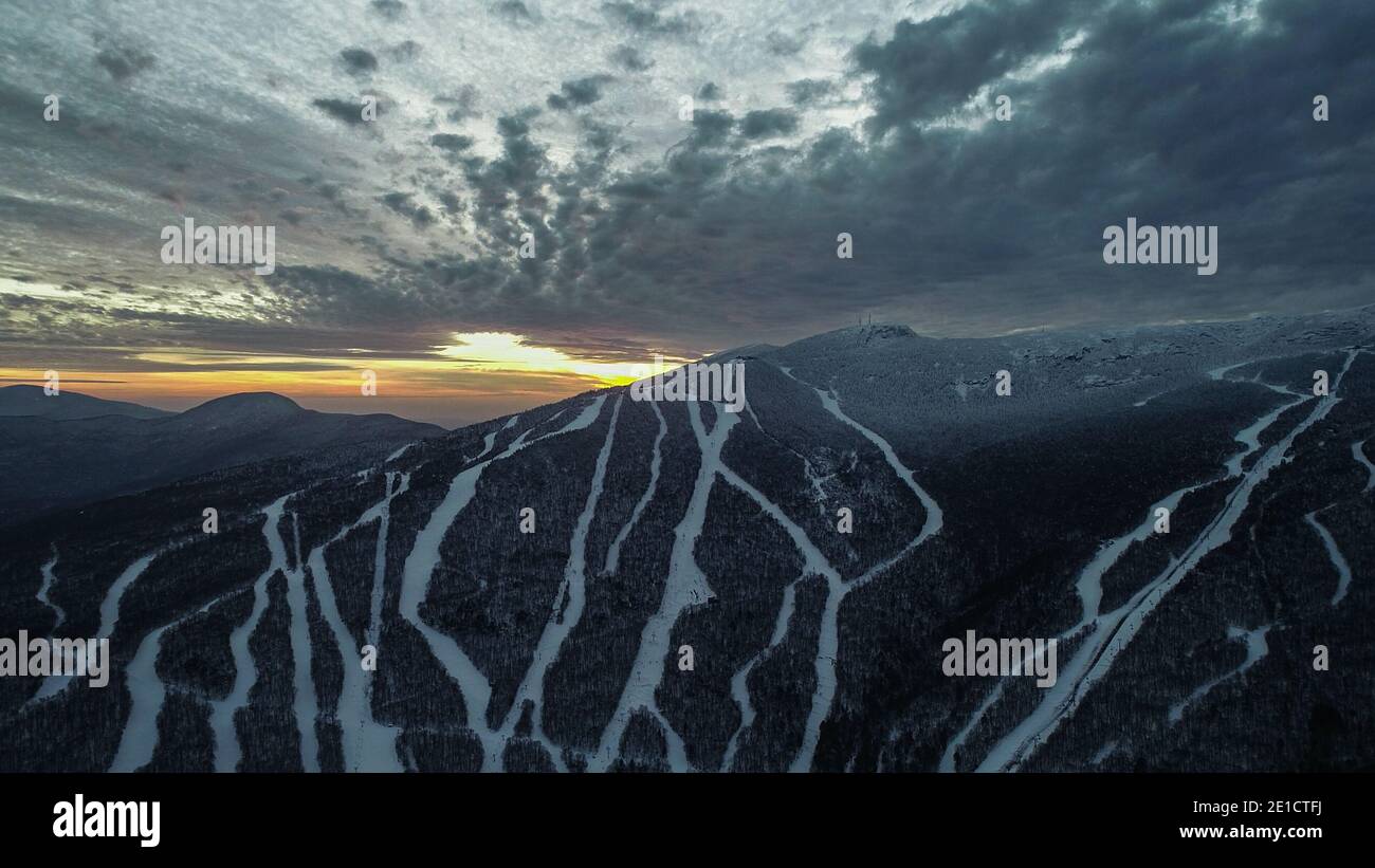 Aerial view to Stowe Mountain Ski Resort in Vermont, USA during sunset ...