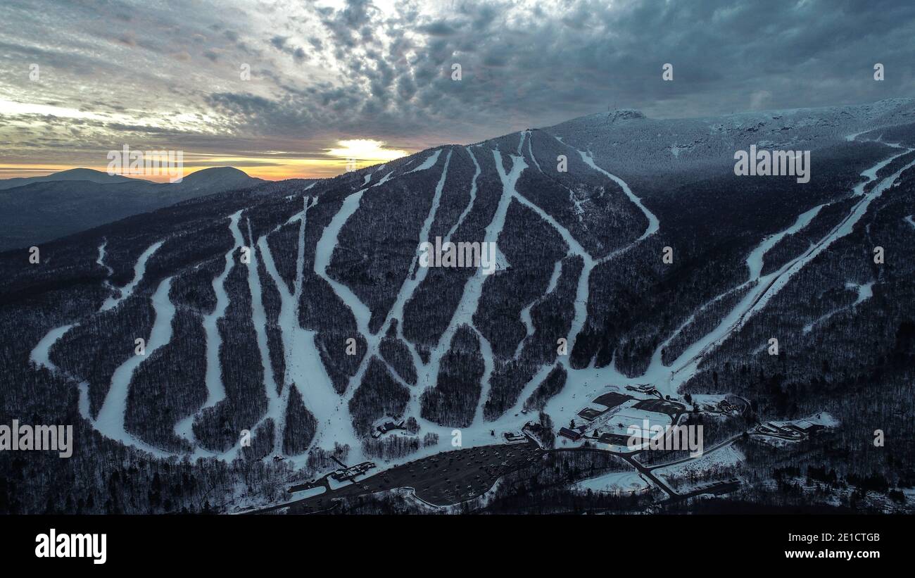 Aerial view to Stowe Mountain Ski Resort in Vermont, USA during sunset ...