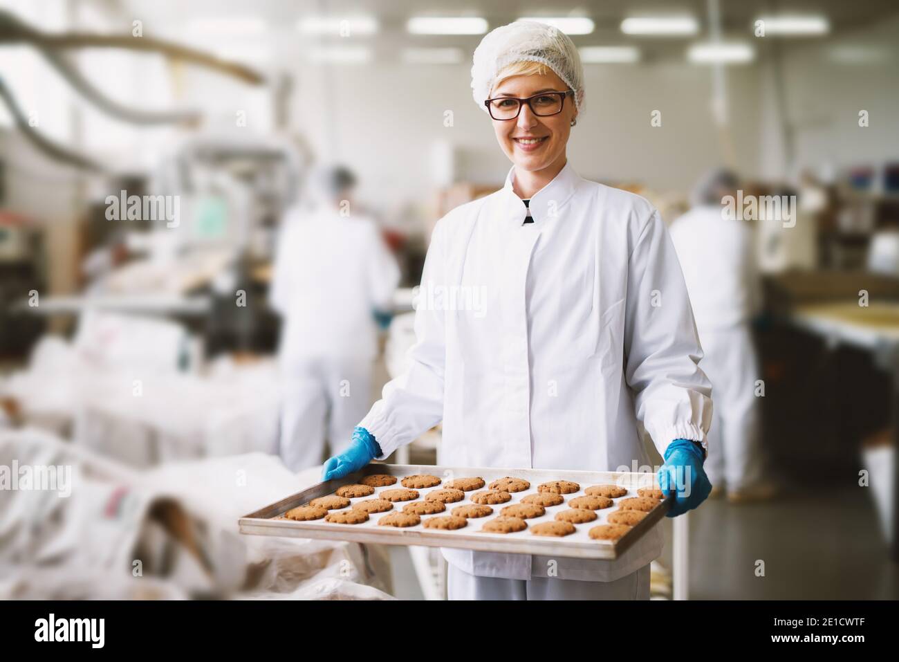 Cookies manufacturing process automated cookie hi-res stock photography ...