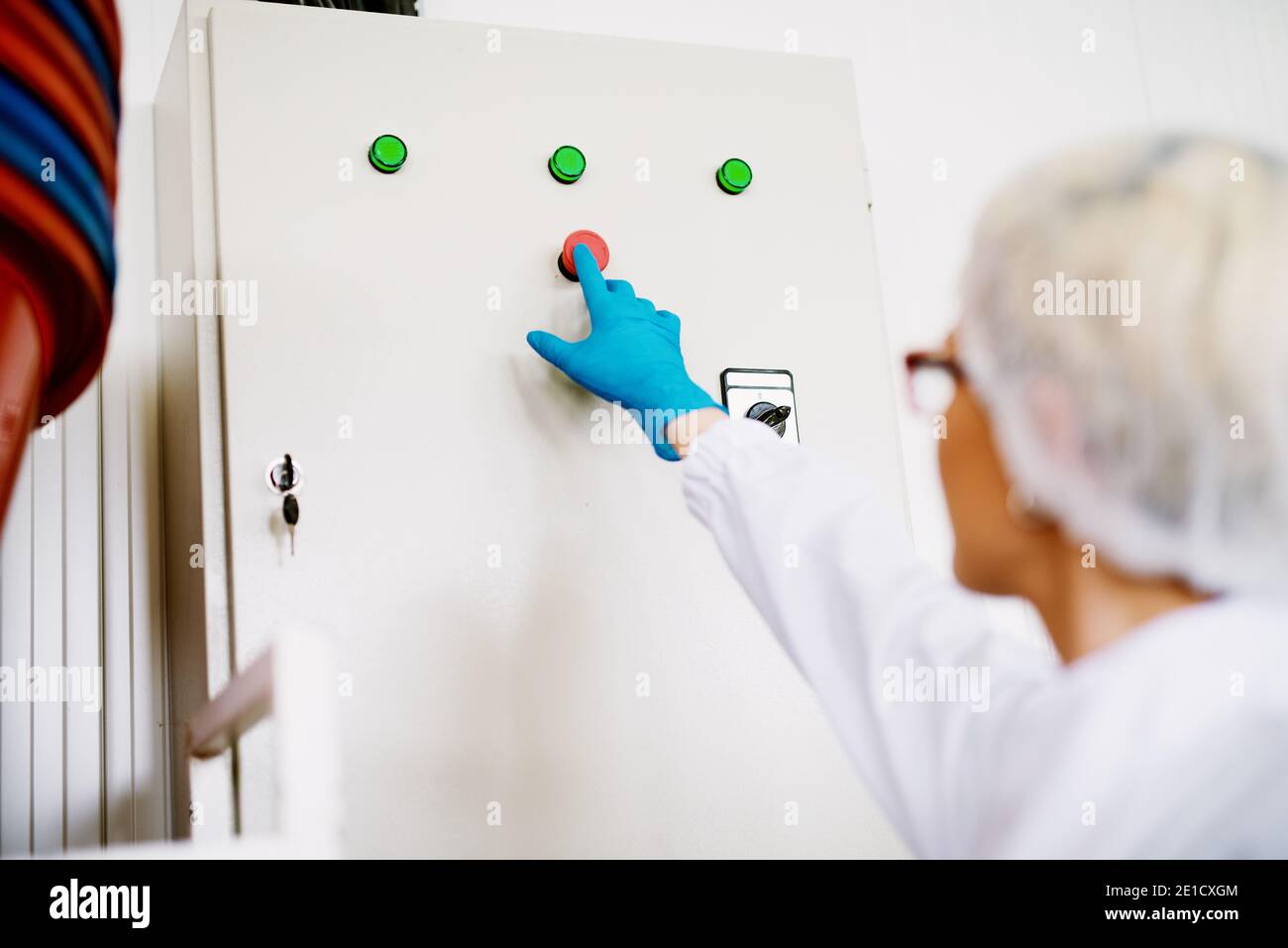 Closeup of female hands pressing a start button on control panel Stock ...