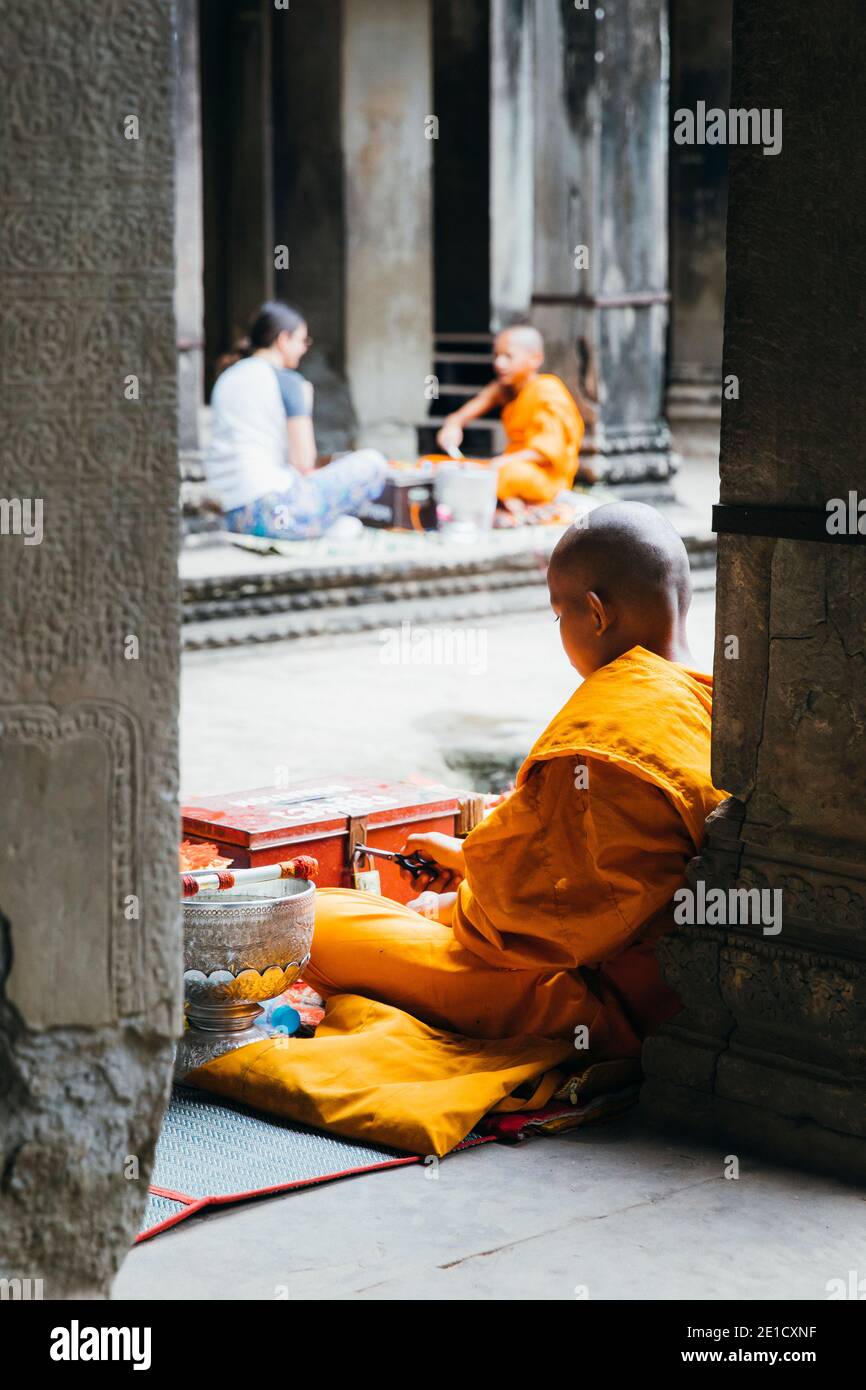 Cambodian monk in an ancient temple in Angkor Wat in Cambodia Stock ...