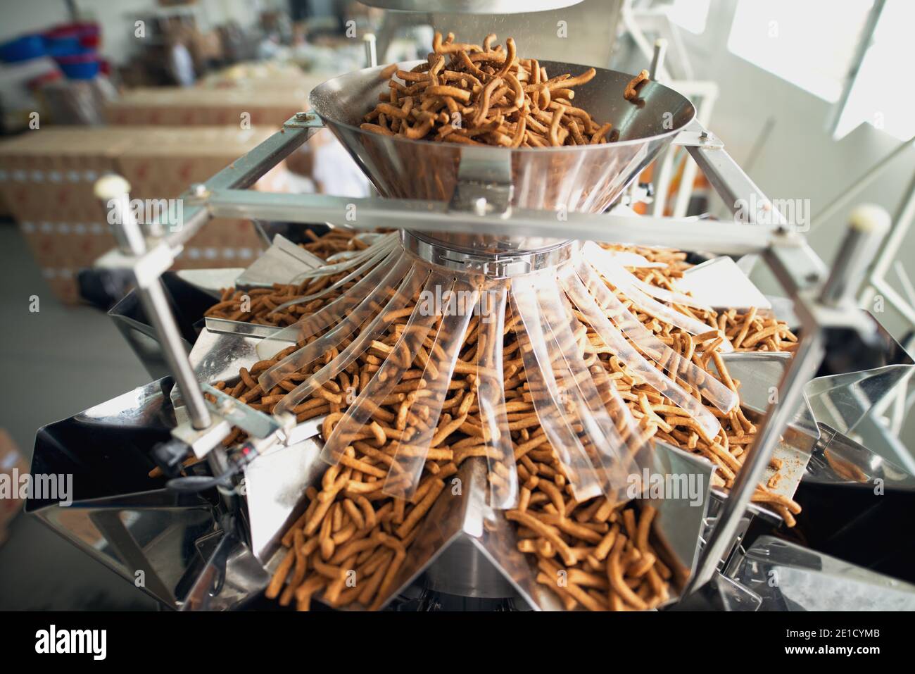 Closeup of salty snacks in food factor production line Stock Photo - Alamy