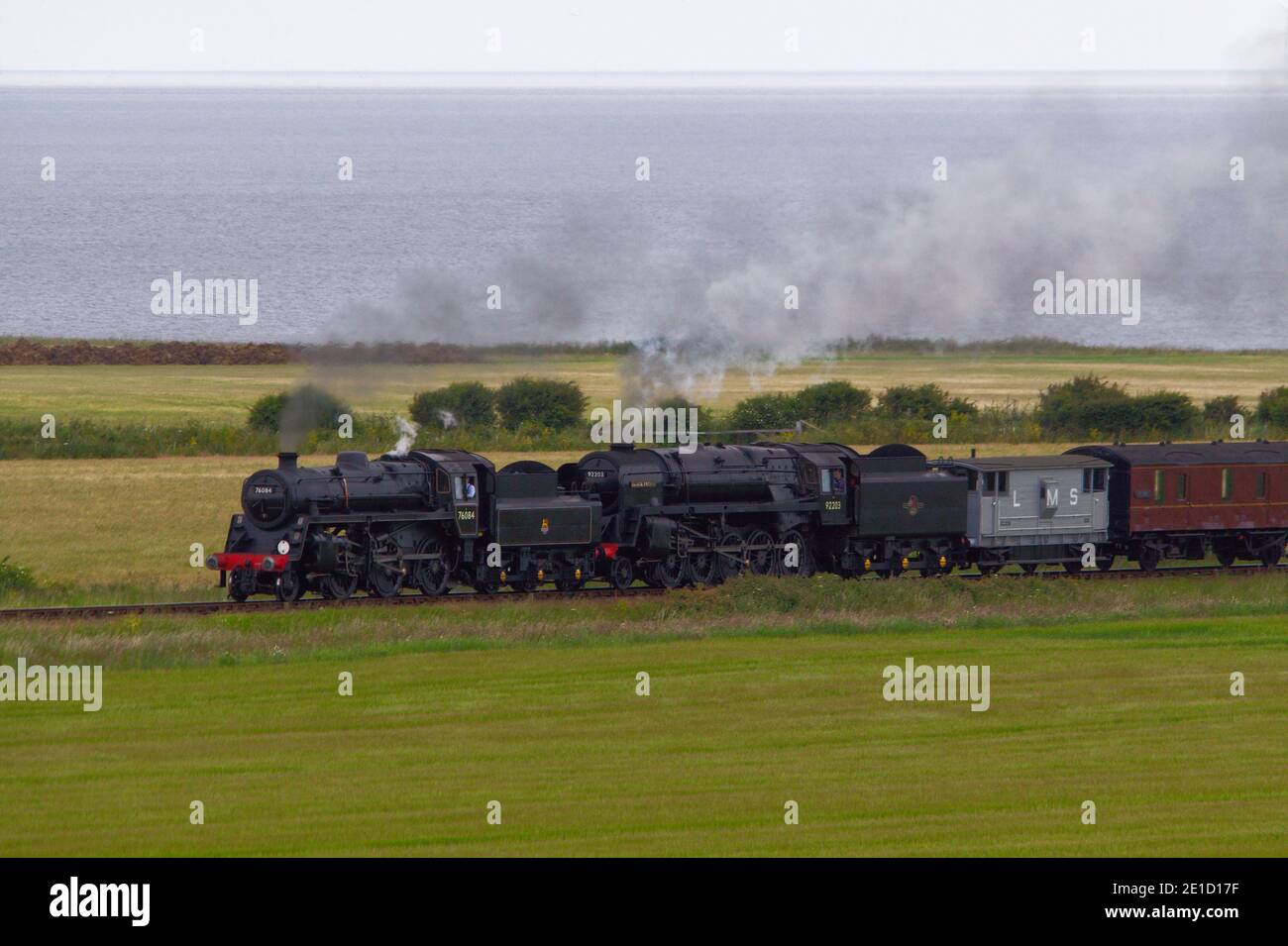 Two steam locomotives, British Railways Standard Class 4MT and 9F Black ...