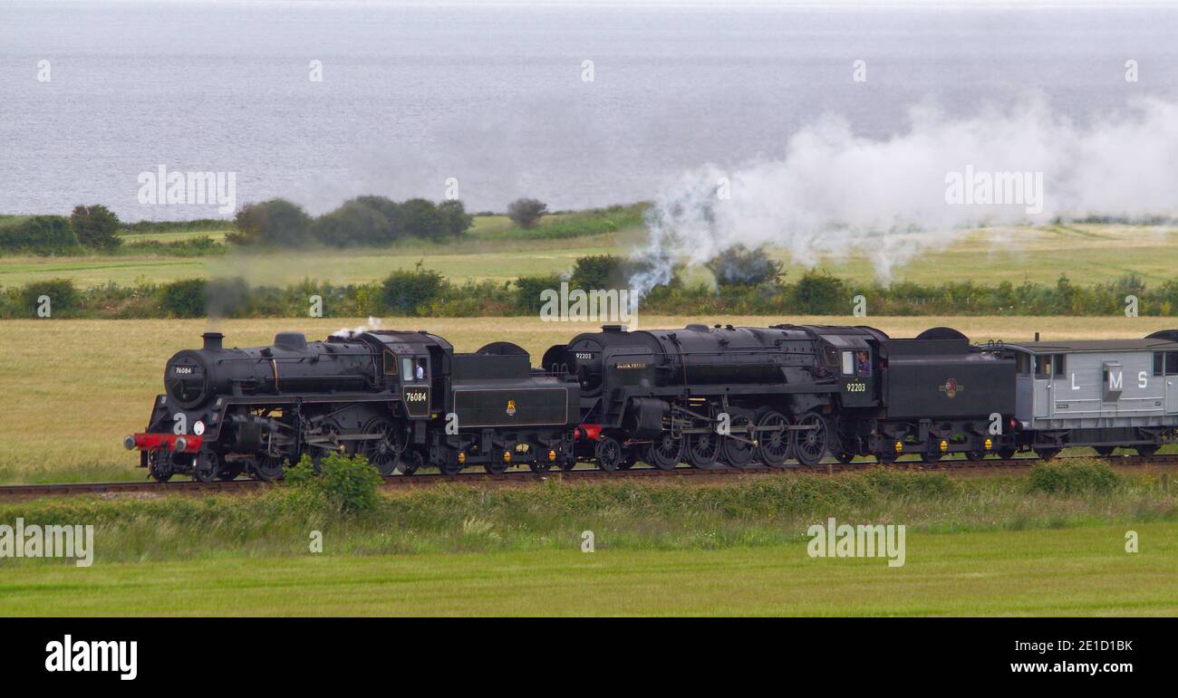 Two steam locomotives, British Railways Standard Class 4MT and 9F Black ...