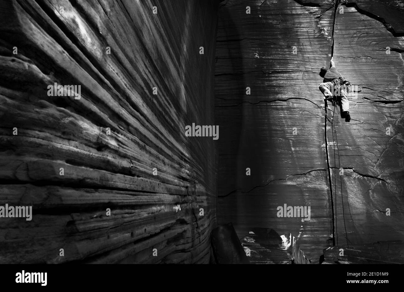 Rock climber climbing cliff, Red Rock Canyon, Nevada, USA Stock Photo ...