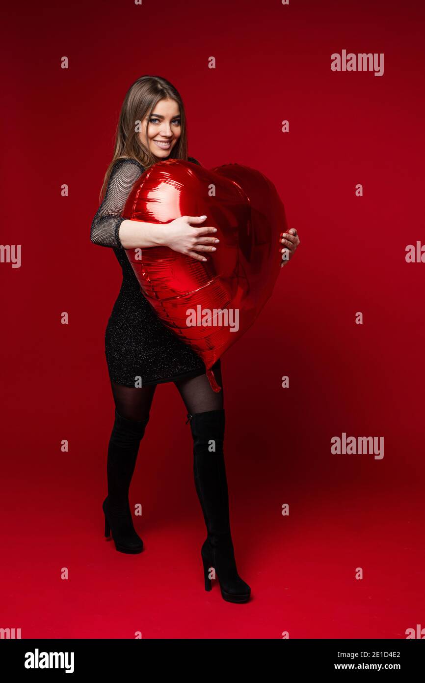 Balloon woman full length hugging hi-res stock photography and images ...