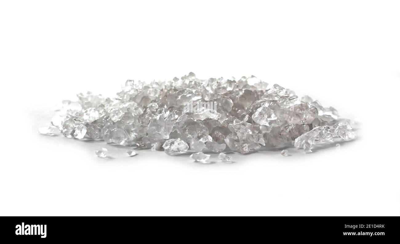 Salt crystals isolated on white Stock Photo - Alamy