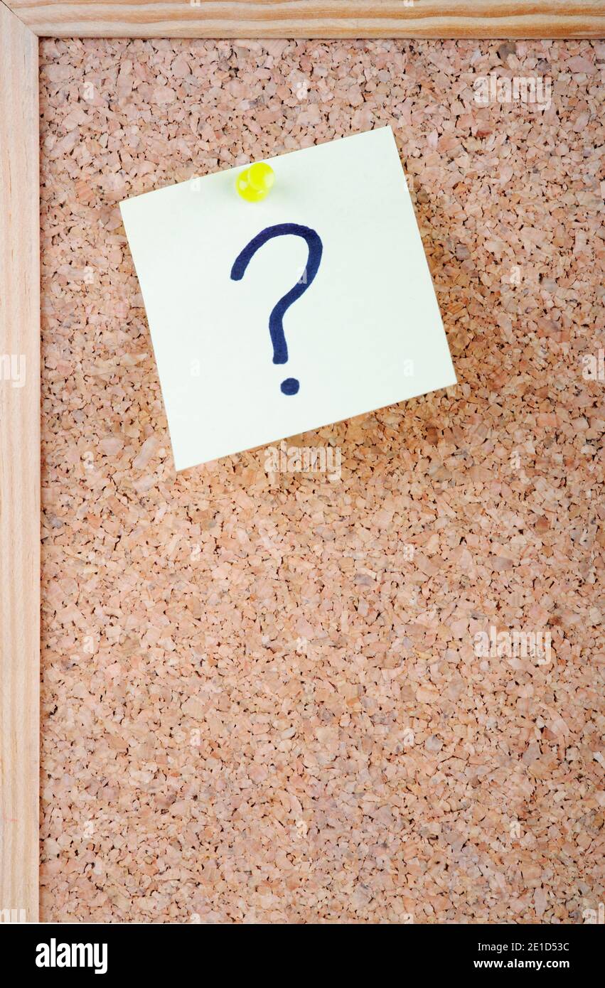 Question mark on cork board Stock Photo - Alamy