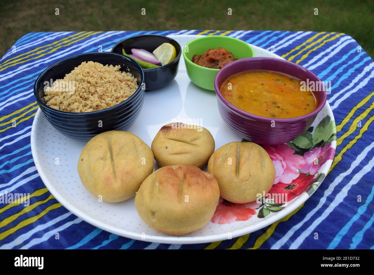 Rajathani dal baati churma baked wheat balls a traditional authentic ...