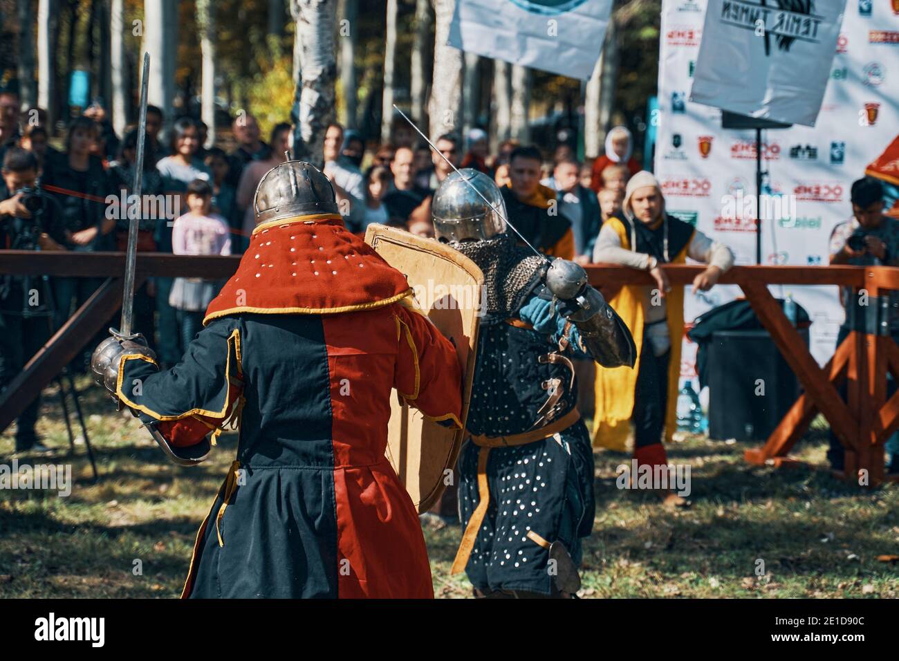 Reconstruction of knight fights in the arena. Fight in front of the ...