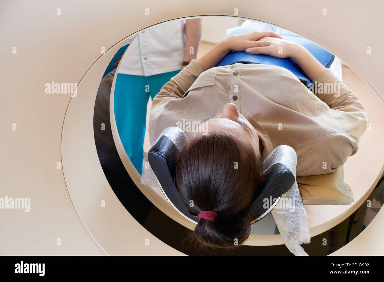Female patient undergoing MRI - Magnetic resonance imaging in Hospital ...