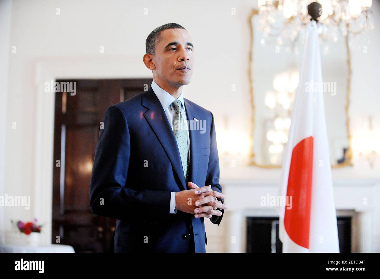 President Barack Obama looks on after making a surprise visite to the ...
