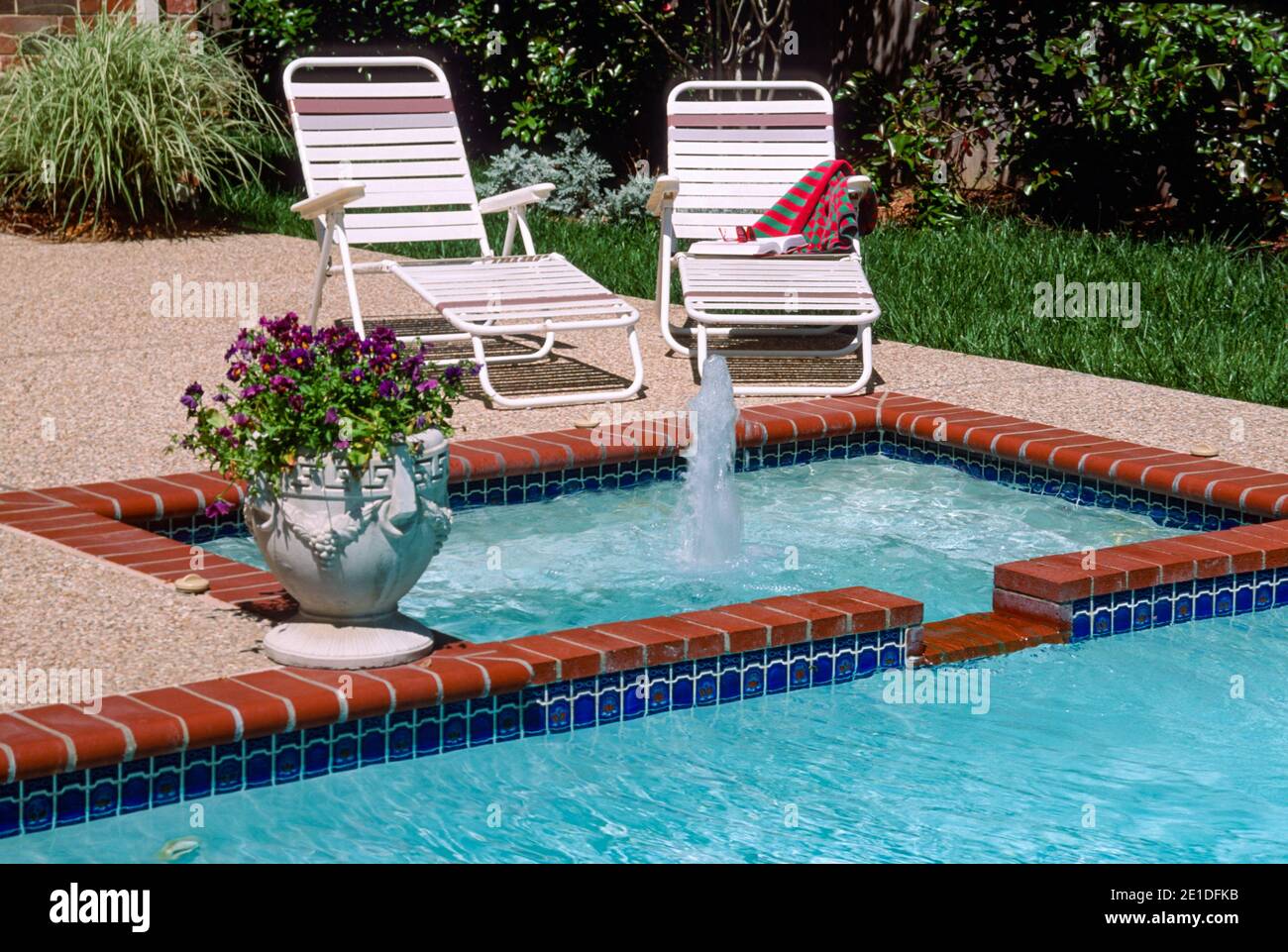 Backyard Swimming Pool and Jacuzzi at Upscale Suburban House Features a ...